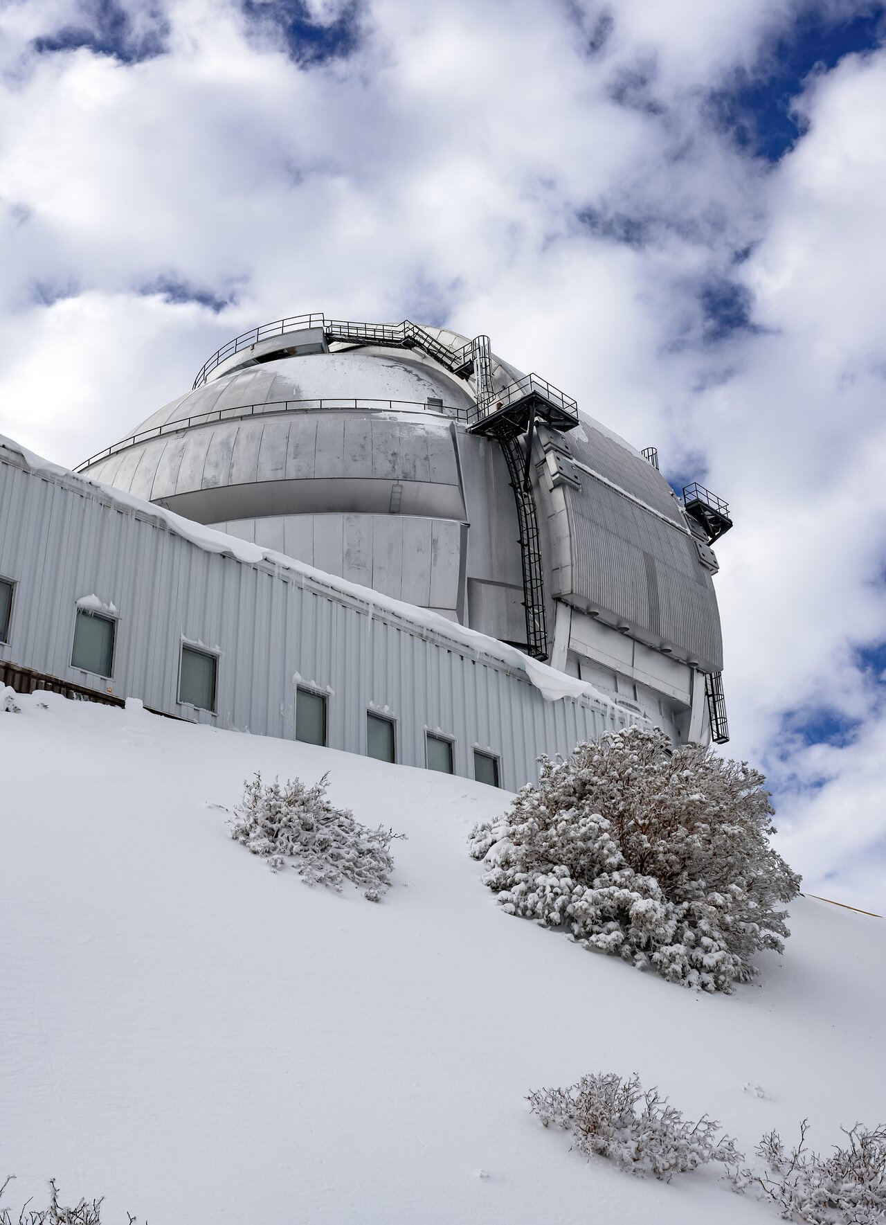Gemini South Telescope Surrounded by Snow | NOIRLab