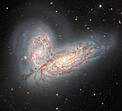 The merging galaxy pair NGC 4568 and NGC 4567 | NOIRLab